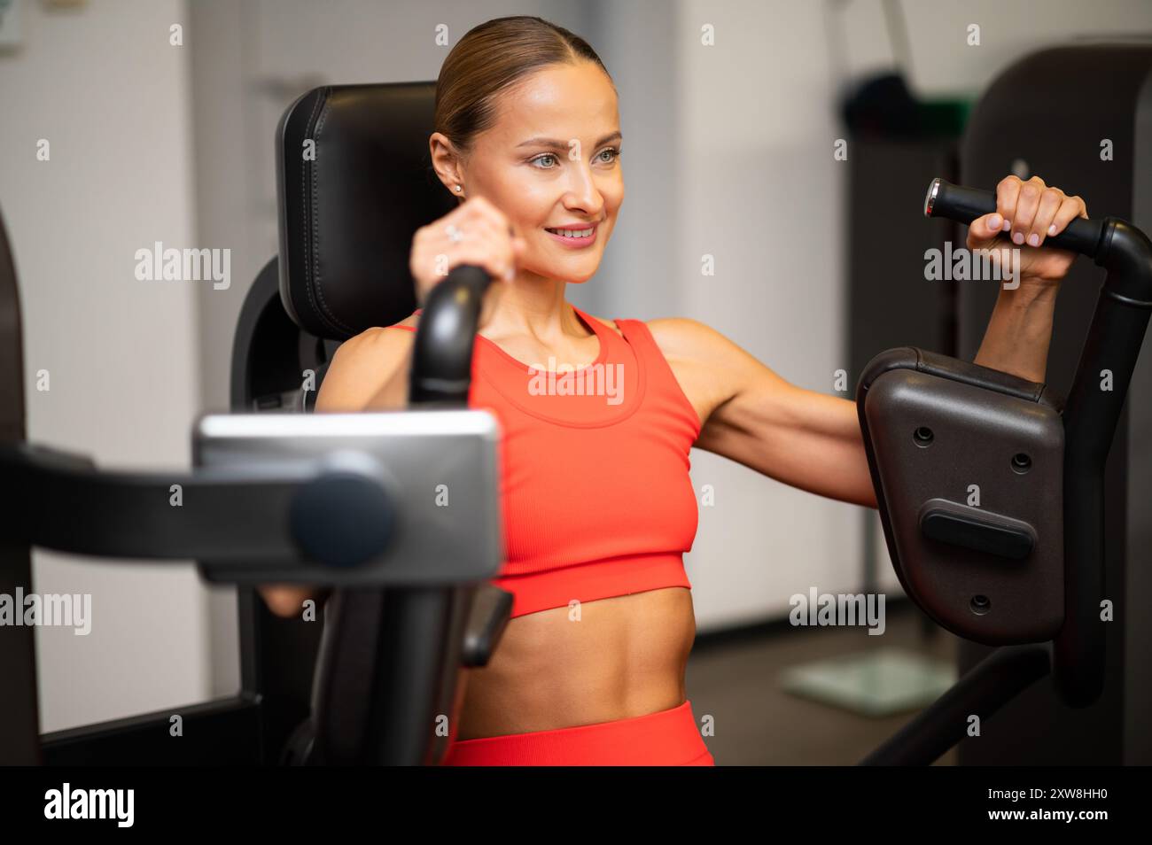 Chest press machine hi-res stock photography and images - Alamy