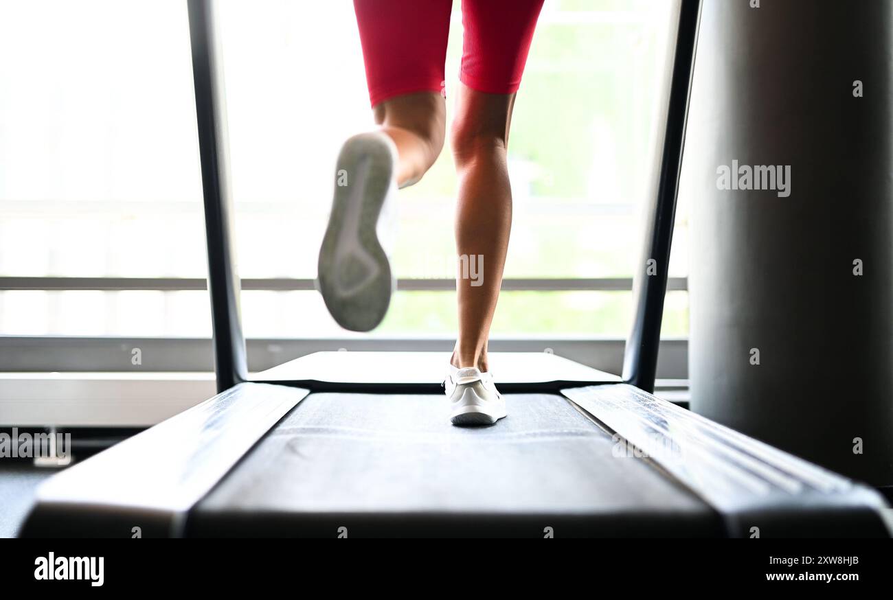 Womans legs on treadmill hi-res stock photography and images - Alamy