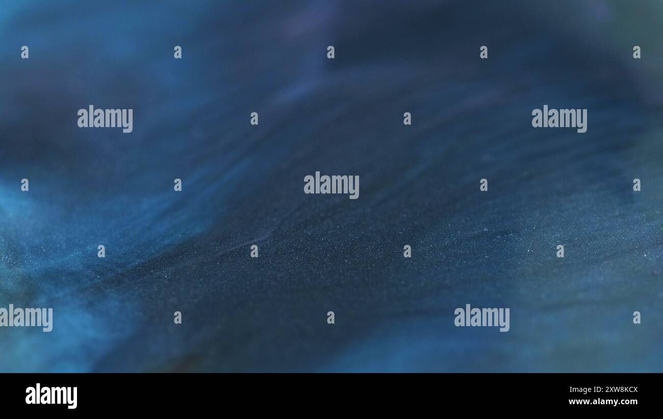 Shiny liquid. Shimmering texture. Defocused blue black sparkling ...