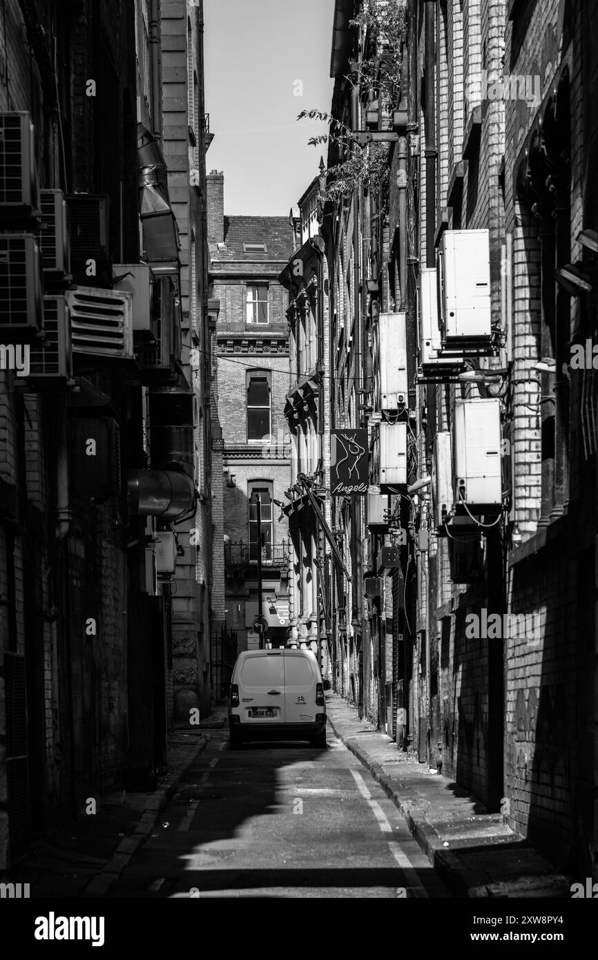 an alley way in Liverpool city centre with a neon lap dance sign ...