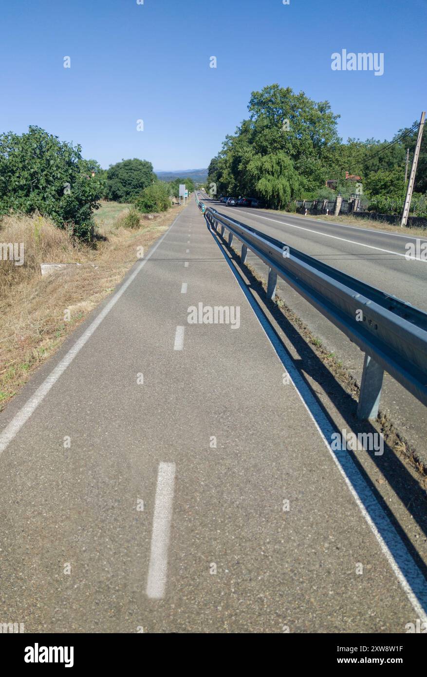 Segregated cycle lane running parallel to a local road. Limited traffic ...