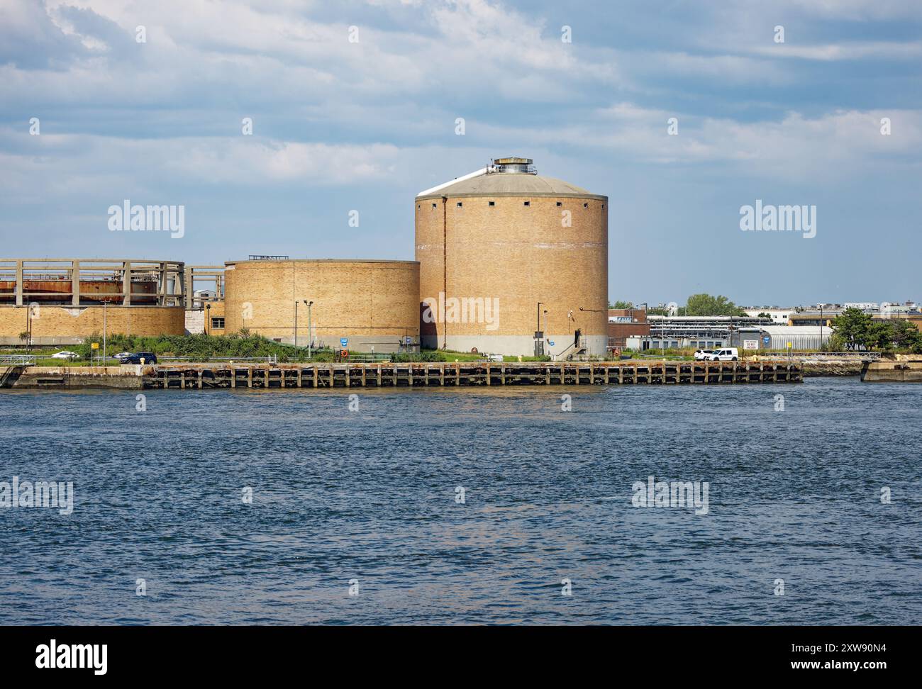 Brick-faced sludge tanks at Hunts Point Water Pollution Control Plant ...