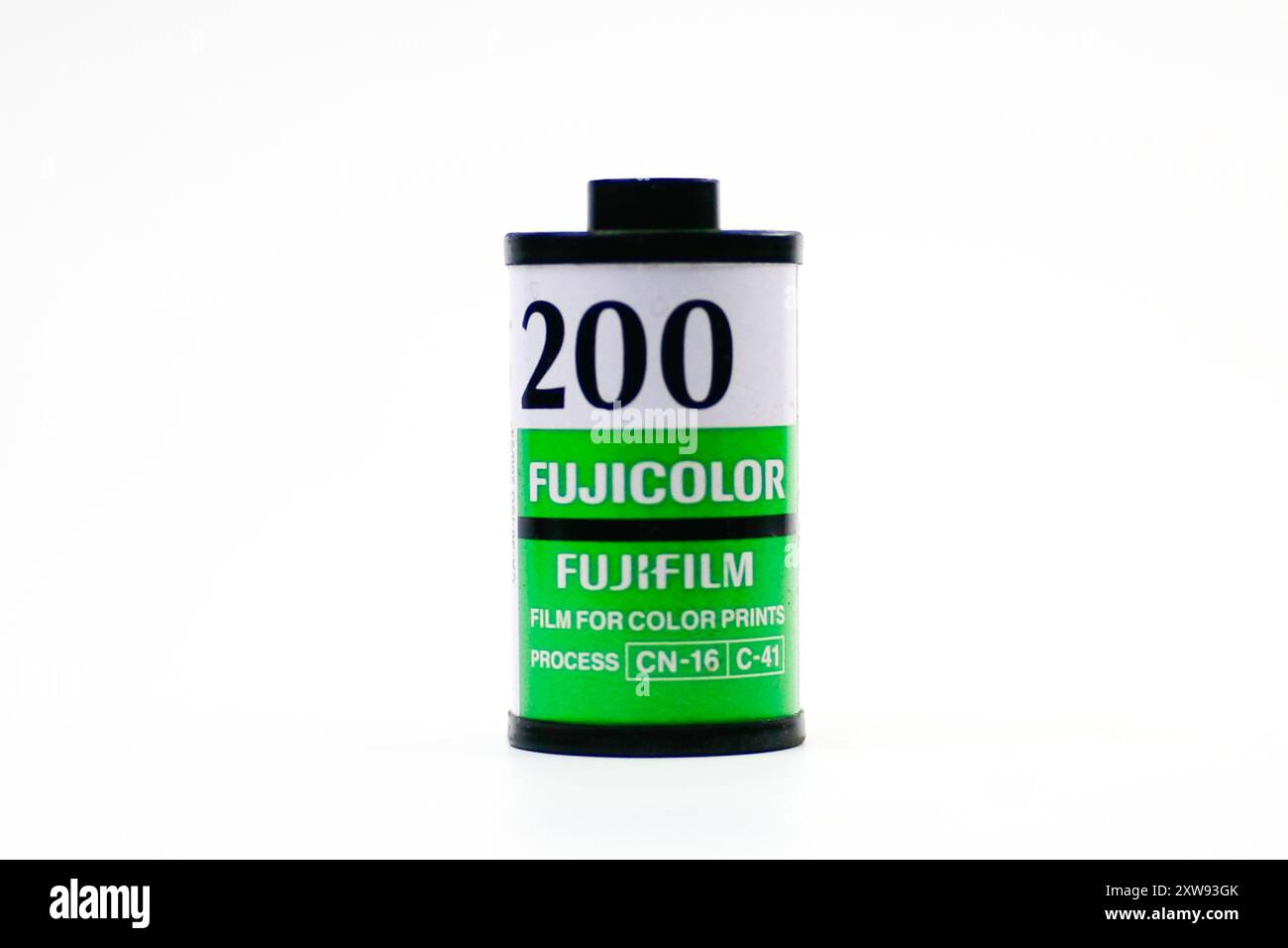 Close up a used roll film Fujicolor 35mm canister isolated on white ...
