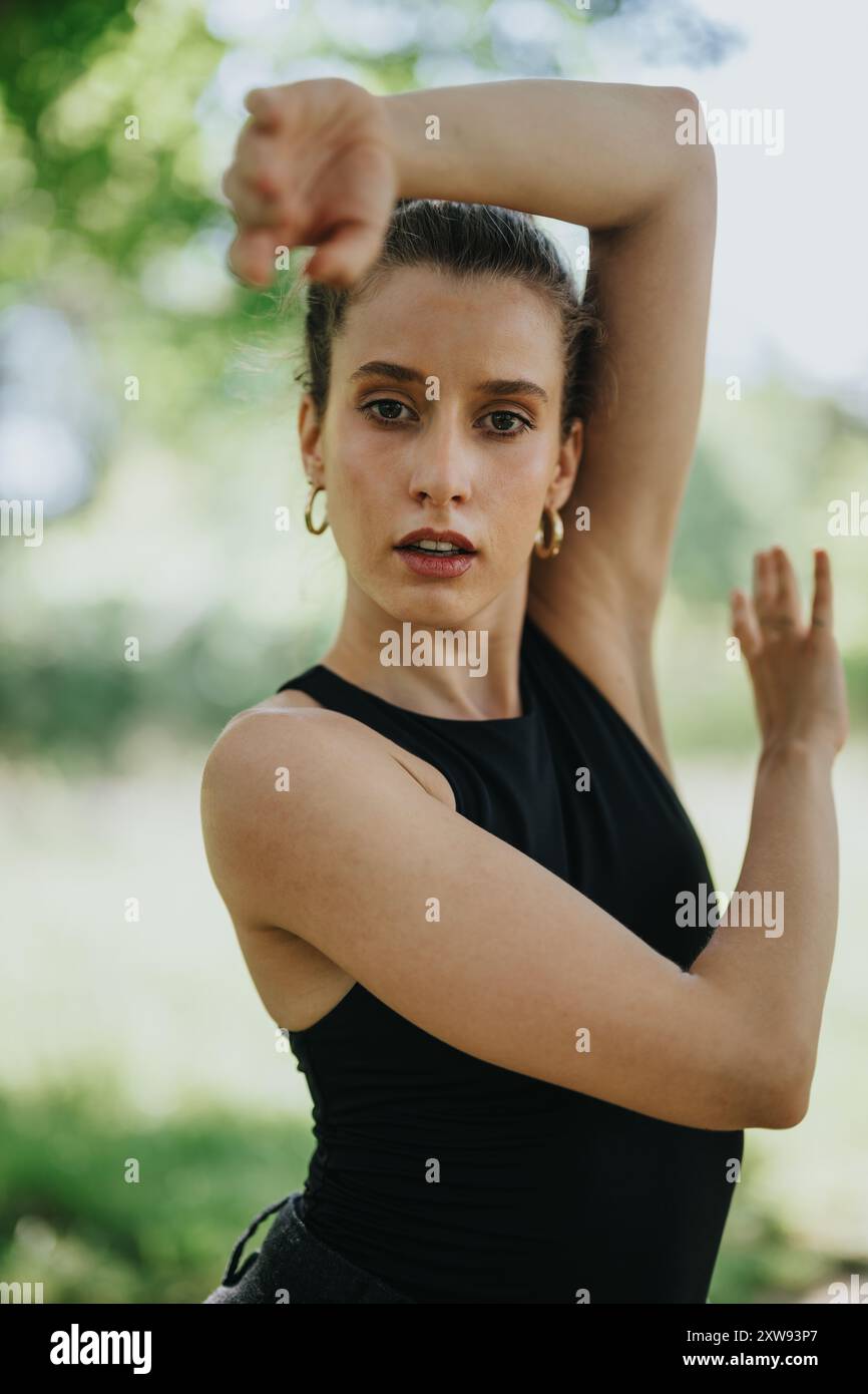 Lovely girl dancing in nature, female dancer performing modern dance Stock Photo - Alamy