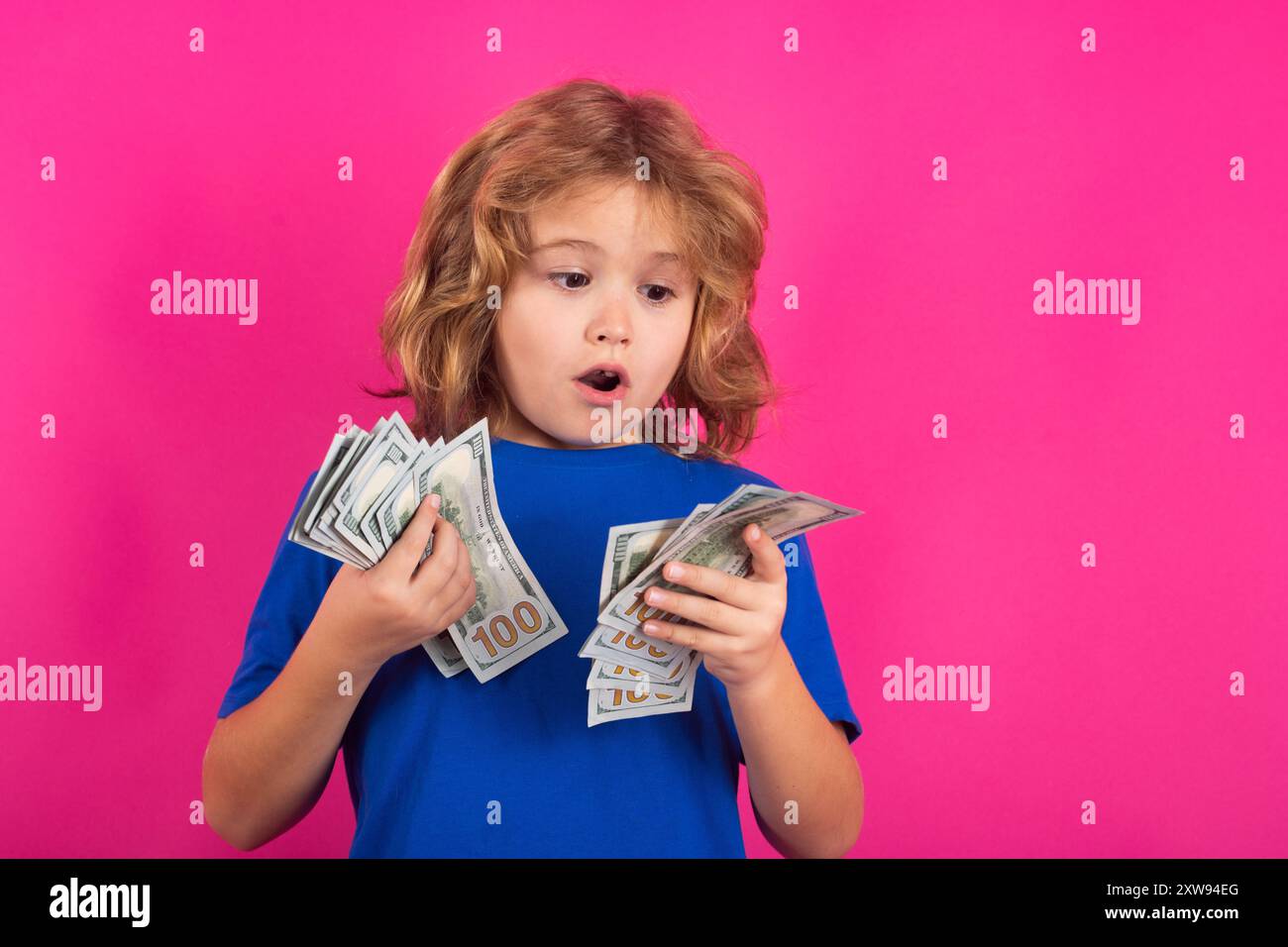 Cash money in dollar banknotes. Portrait of a child with money dollars ...