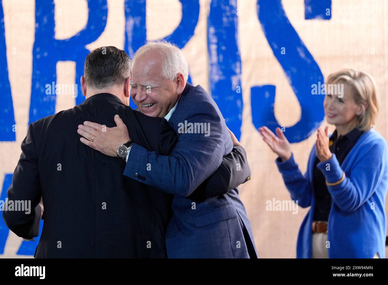 Democratic vice presidential nominee Minnesota Gov. Tim Walz, center ...