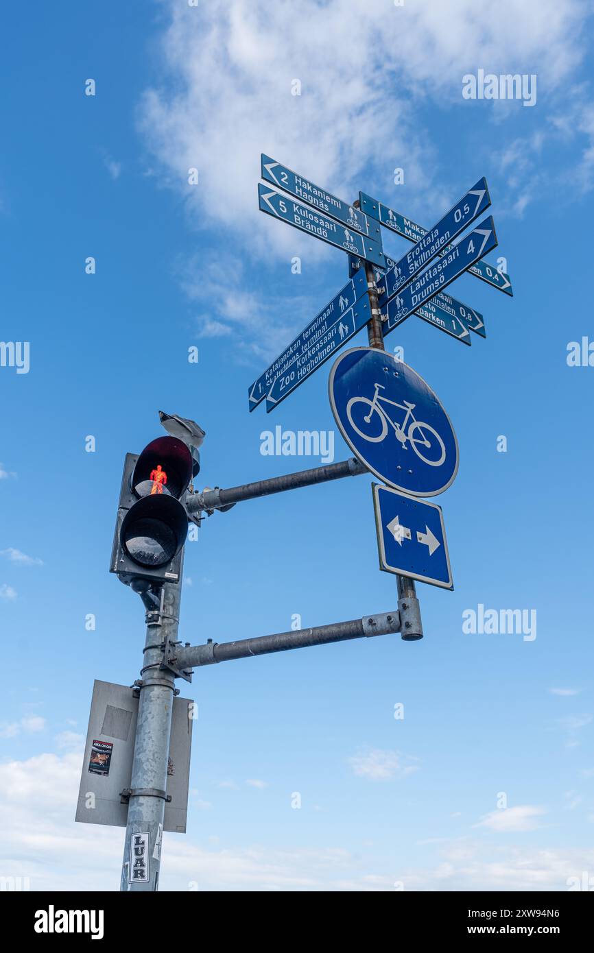Directional Signs and Bicycle in Helsinki Stock Photo - Alamy