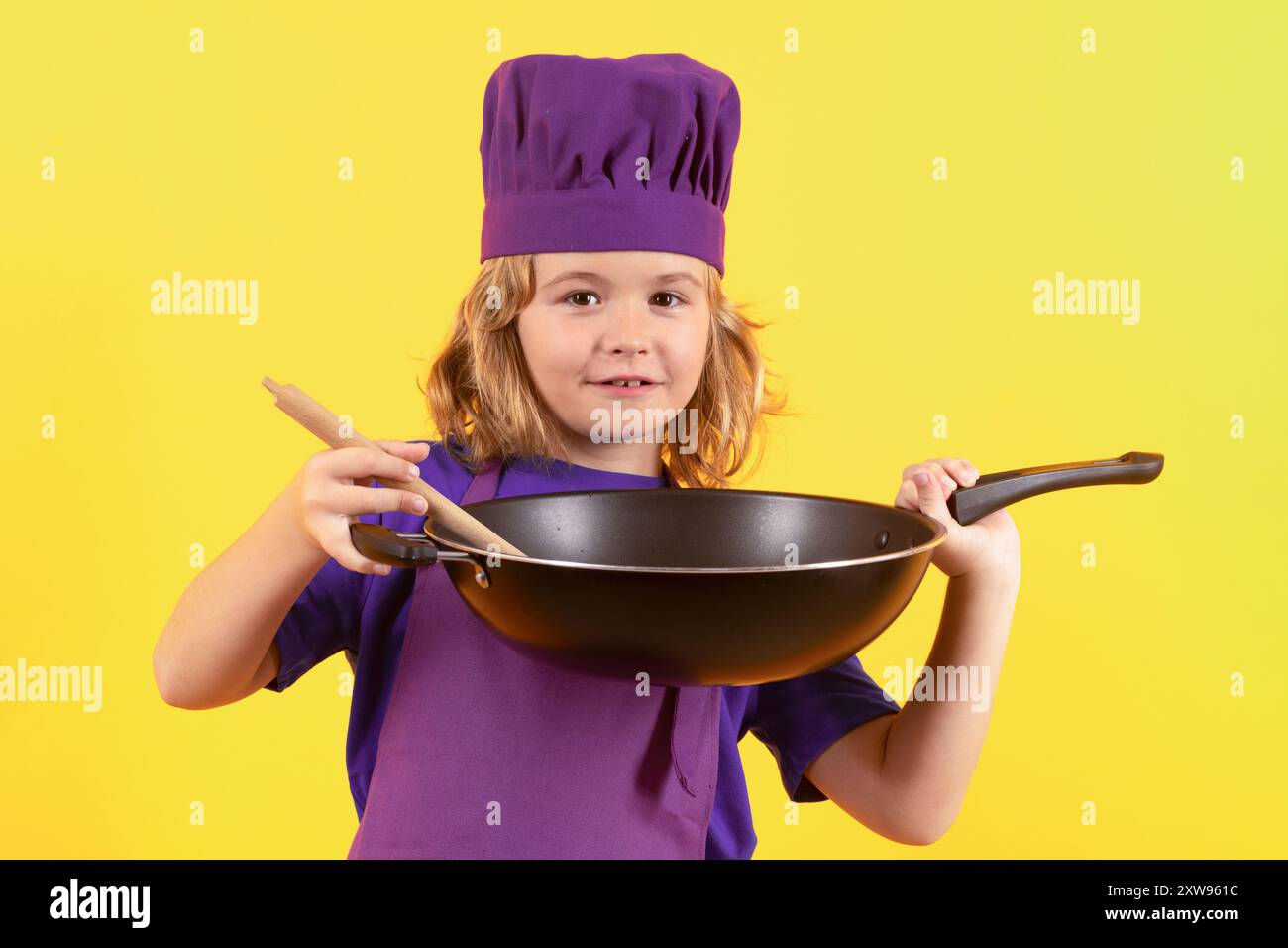 Kid cook with cooking pan. Kid chef cook, studio portrait. Children ...