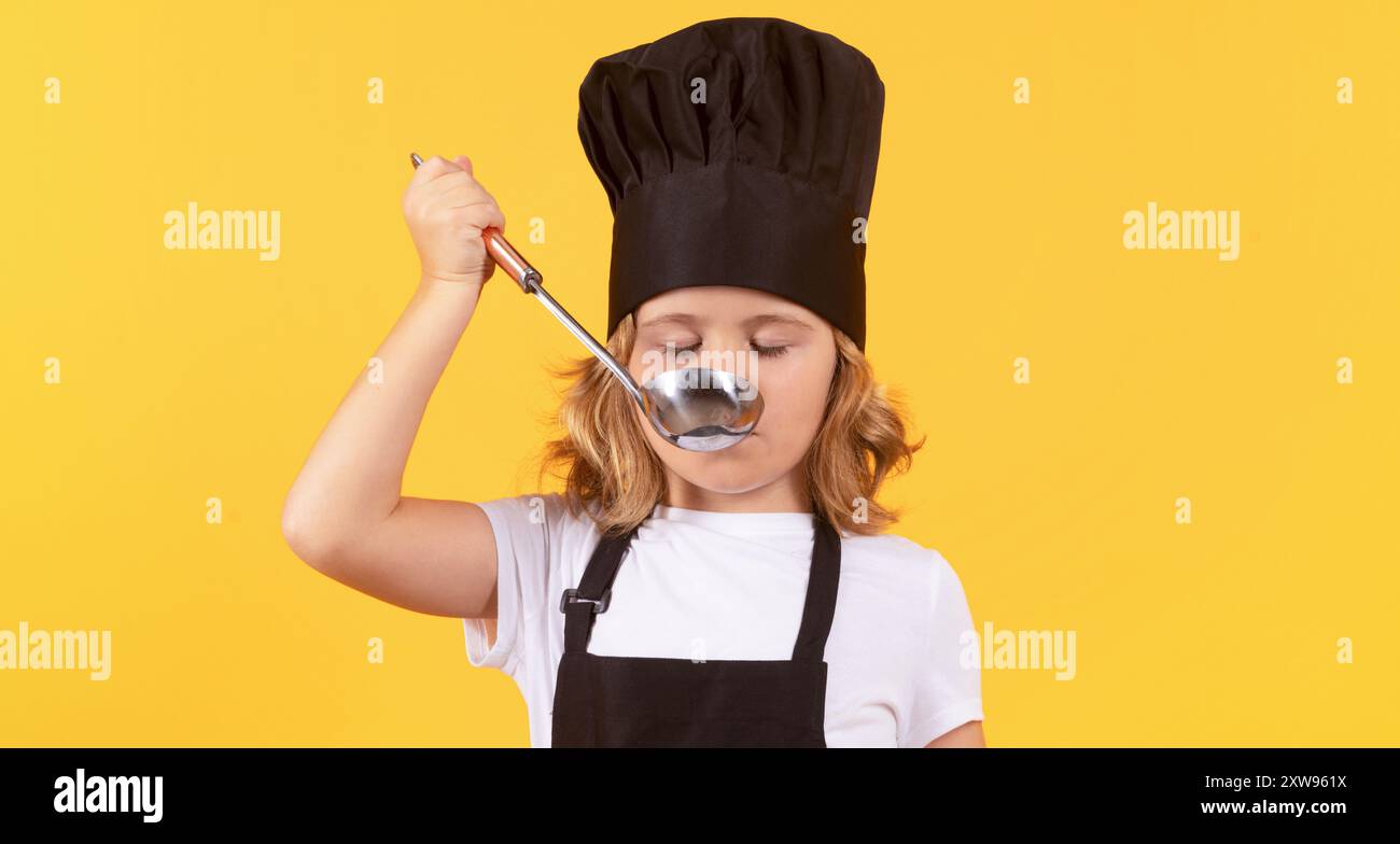 Funny kid chef cook with kitchen ladle, studio portrait. Child chef ...