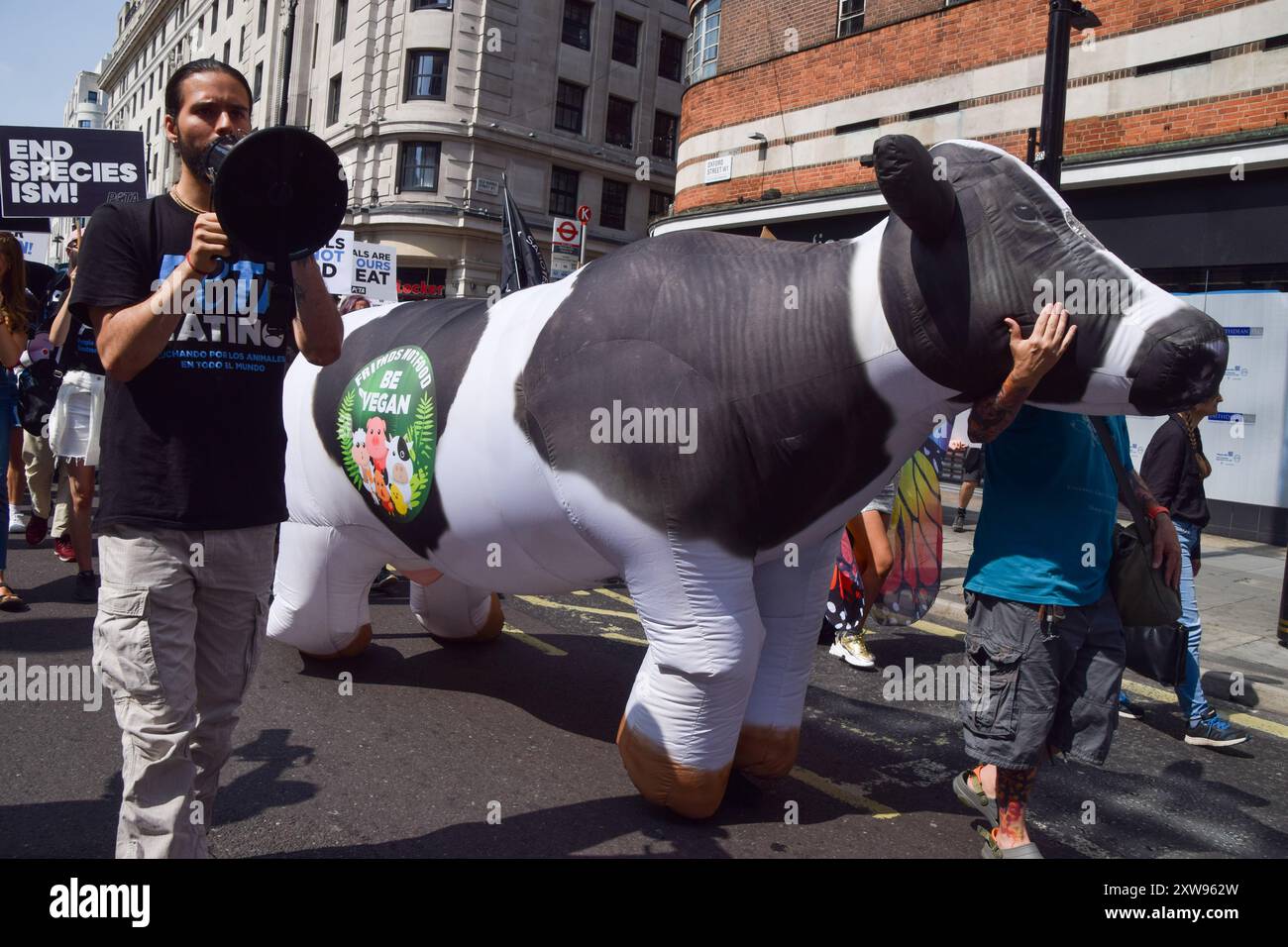 London, UK. 17th Aug, 2024. Animal rights activists in an inflatable ...