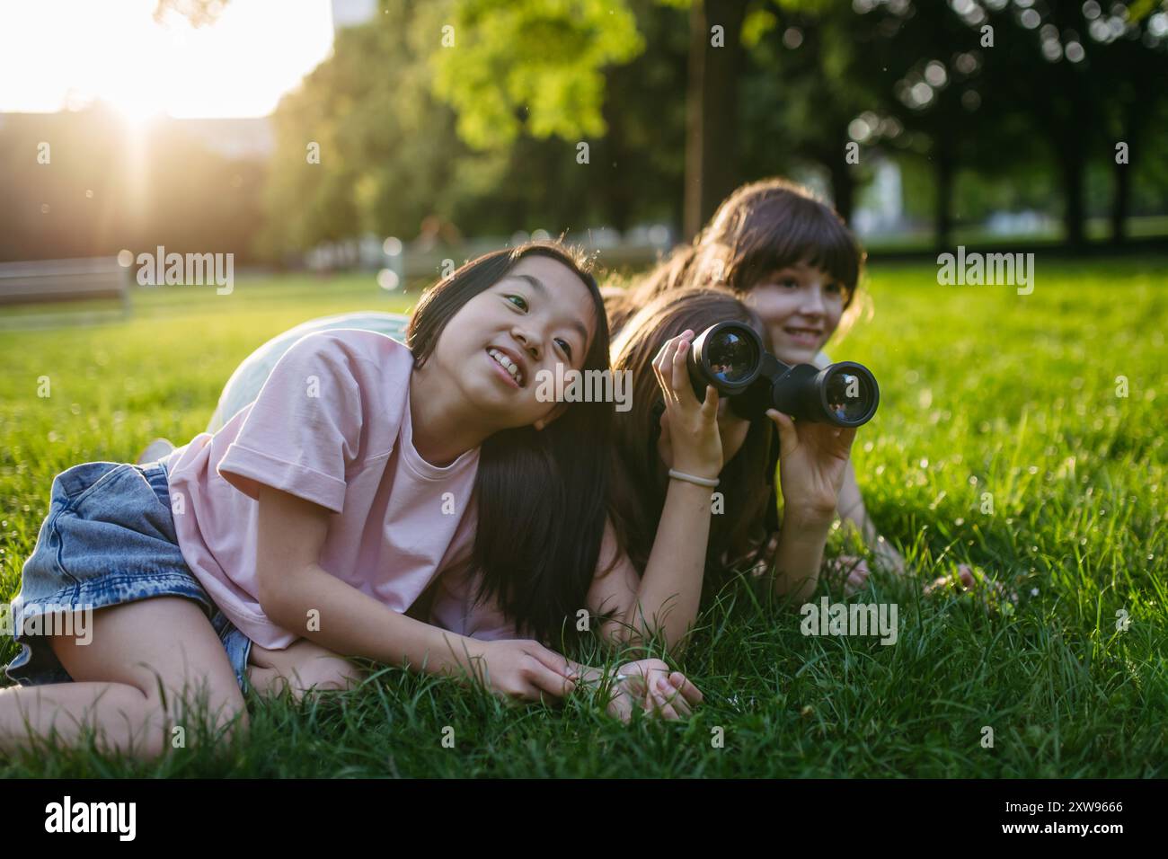 Young girl students learning about nature and wildlife in urban ...
