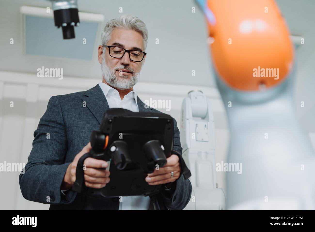 Automation, robotics engineer working on robotic knee replacement ...