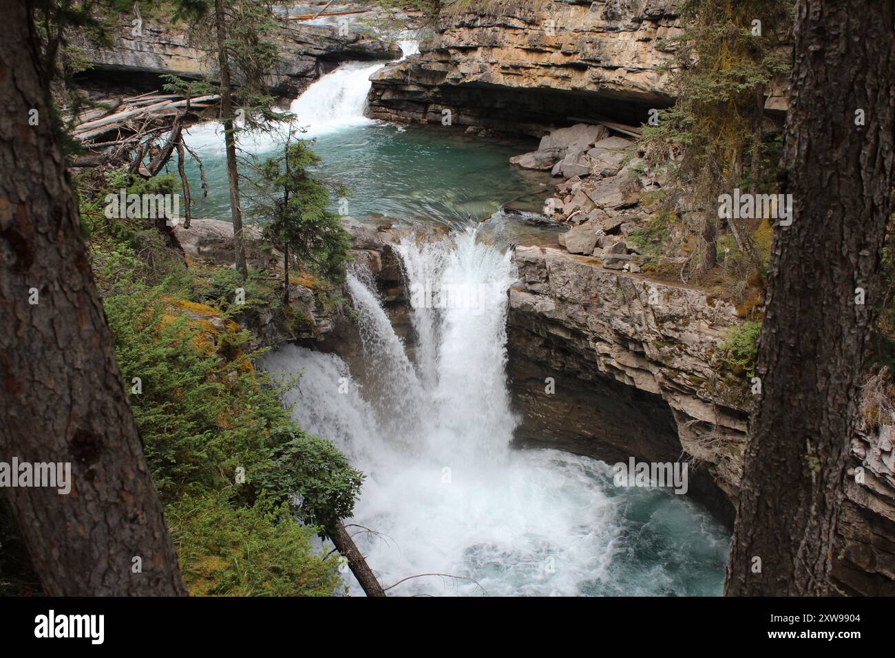 A waterfall in Johnston Canyon in Banff National Park, Canada Stock ...