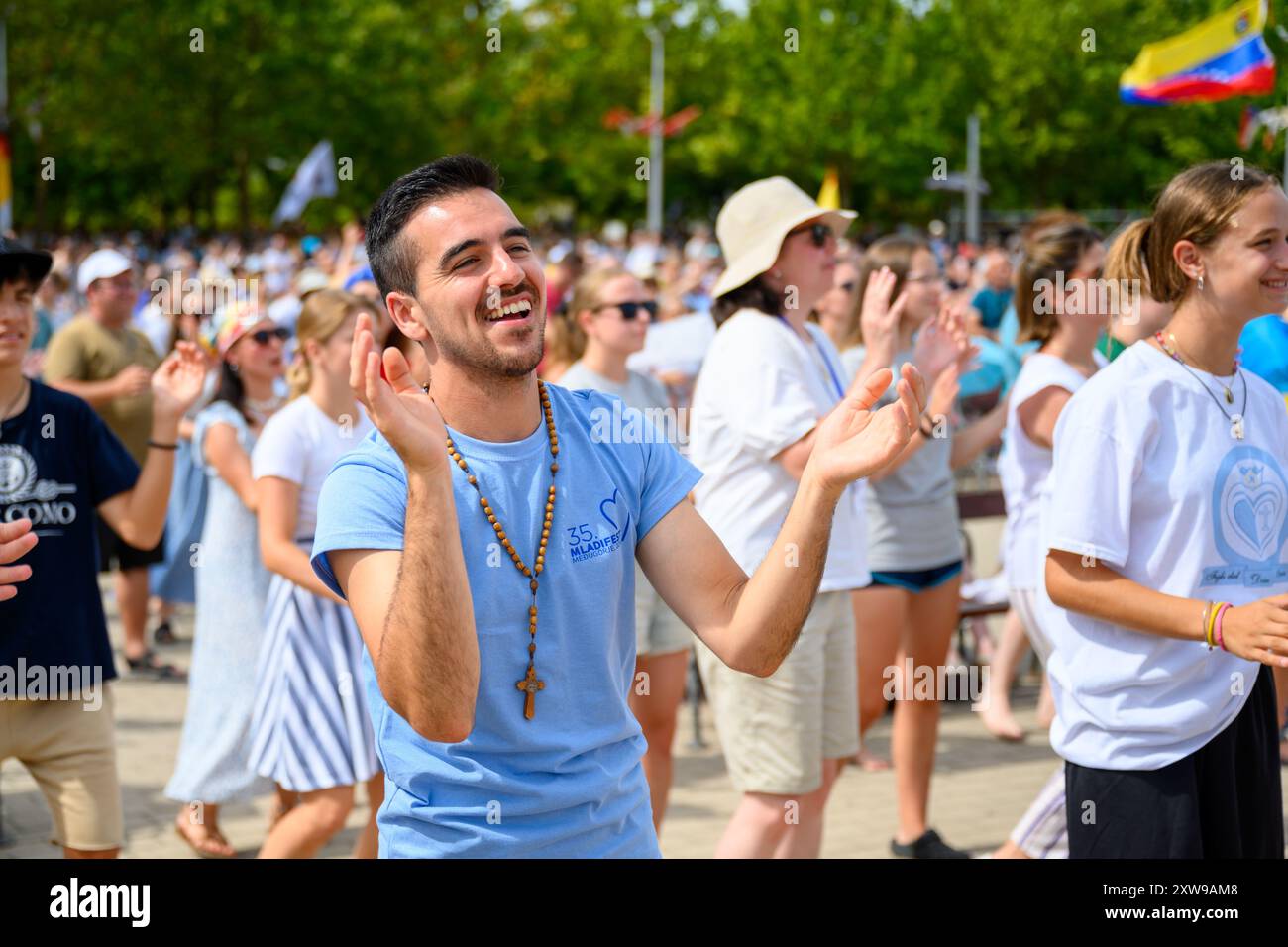 Young people dancing to Christian songs at Mladifest 2024, the annual youth festival in ...