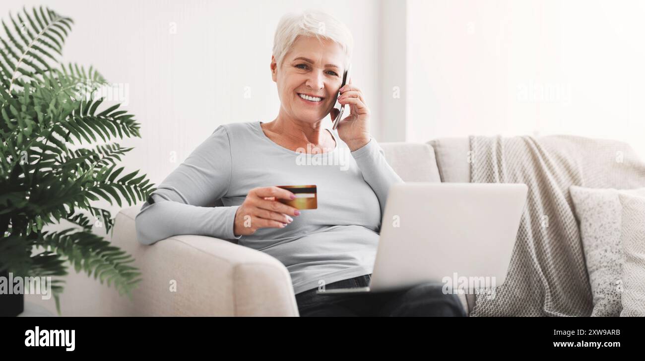 Mature lady shopping online with credit card and laptop Stock Photo - Alamy