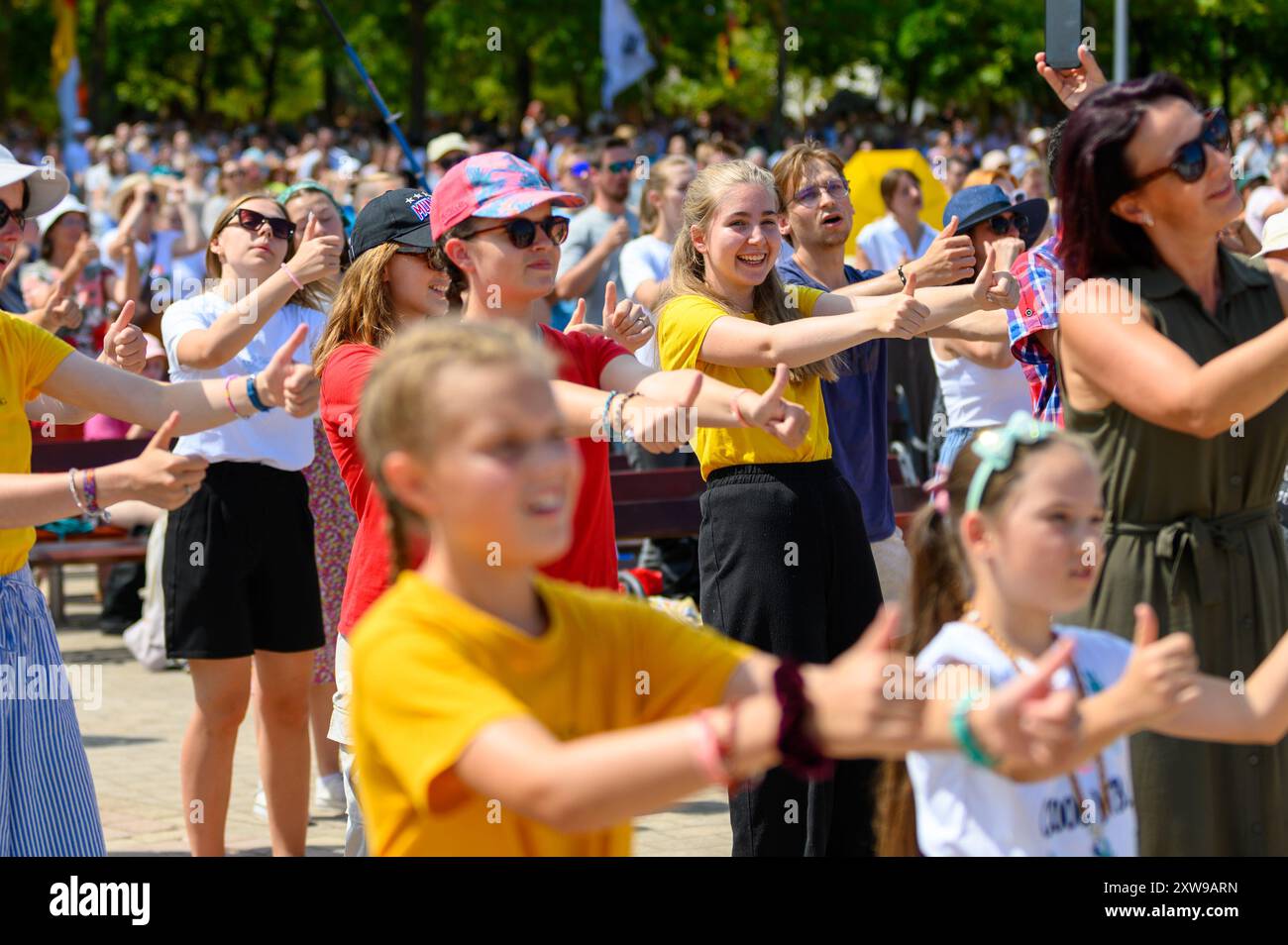 Young people dancing to Christian songs at Mladifest 2024, the annual youth festival in ...