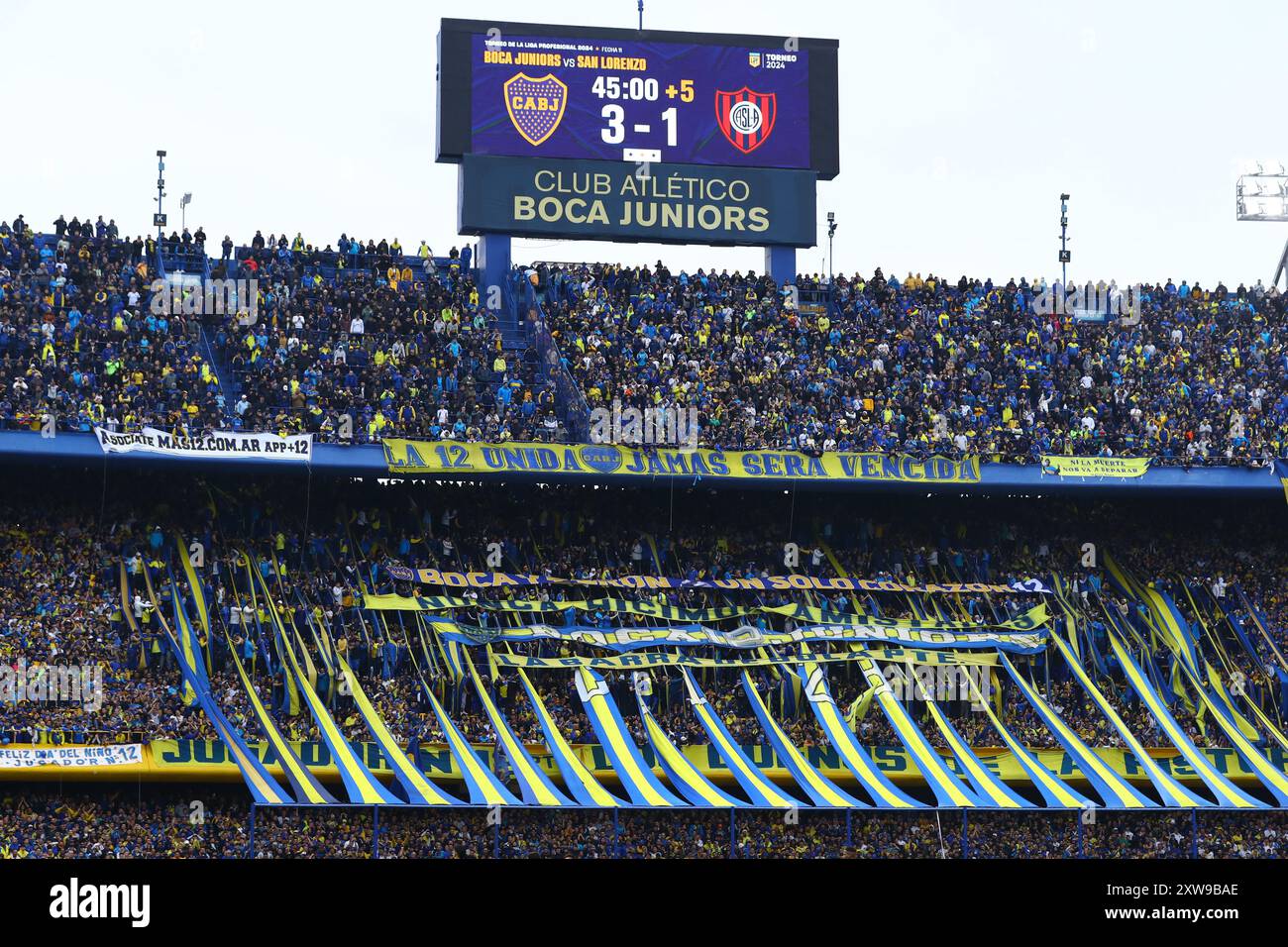 Boca Juniors’ supporters cheer for their team during the Argentine ...