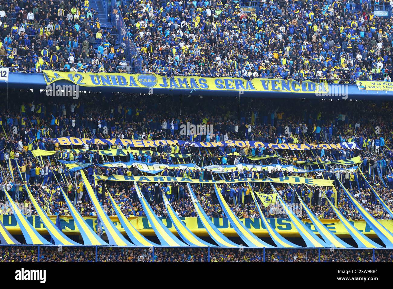 Boca Juniors’ supporters cheer for their team during the Argentine ...