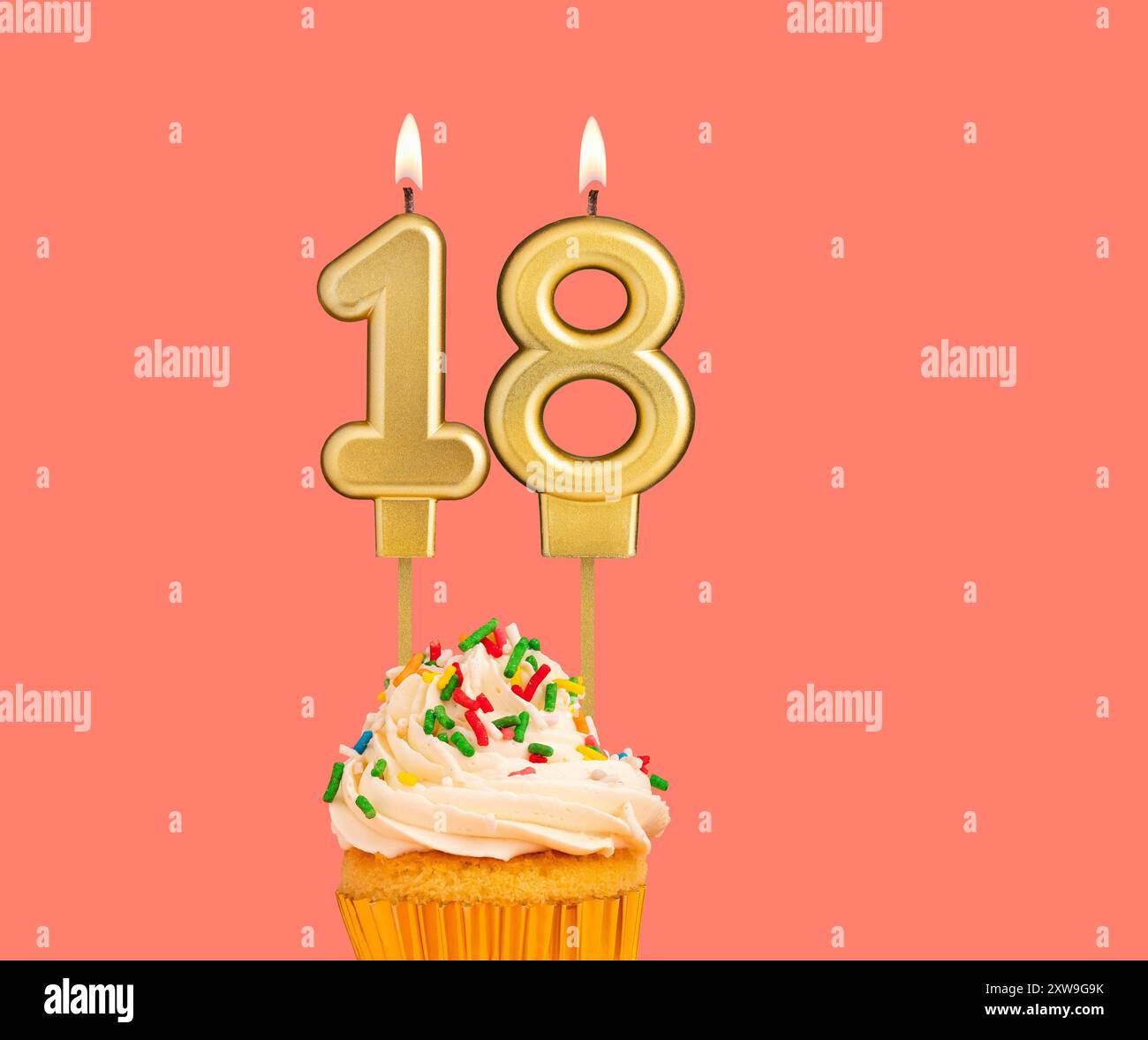 Birthday candle and cupcake - Number 18 Stock Photo - Alamy