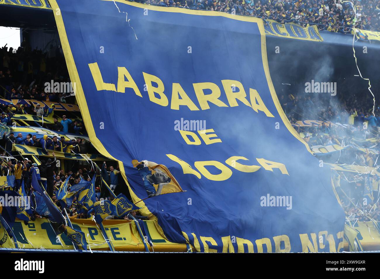 Boca Juniors’ supporers cheer for their team during the Argentine ...
