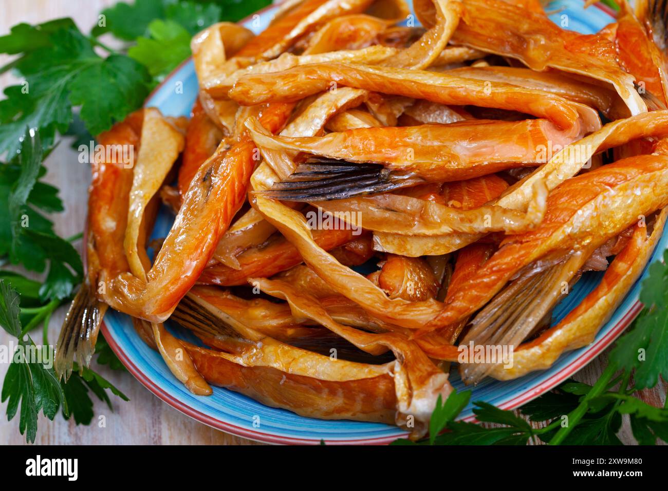 Cold smoked salmon belly strips Stock Photo - Alamy