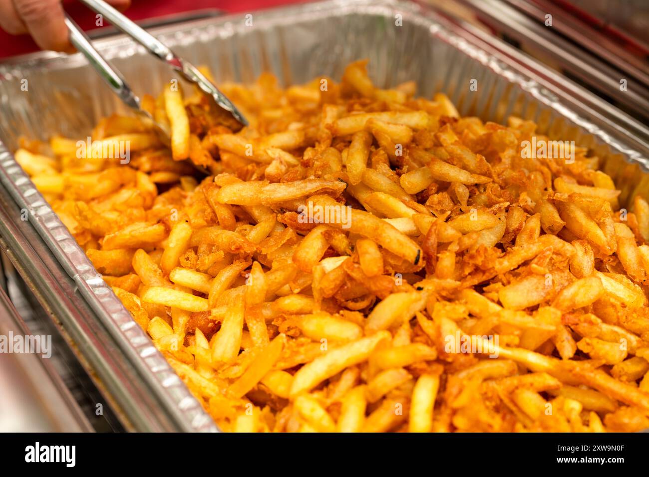 Grabbing chips hi-res stock photography and images - Alamy