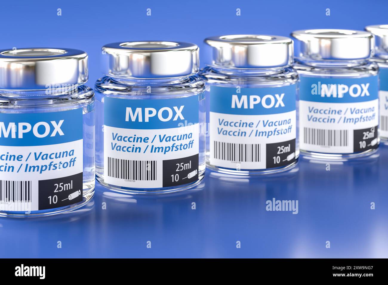 Vials of vaccine against Mpox: The word vaccination in English, Spanish ...