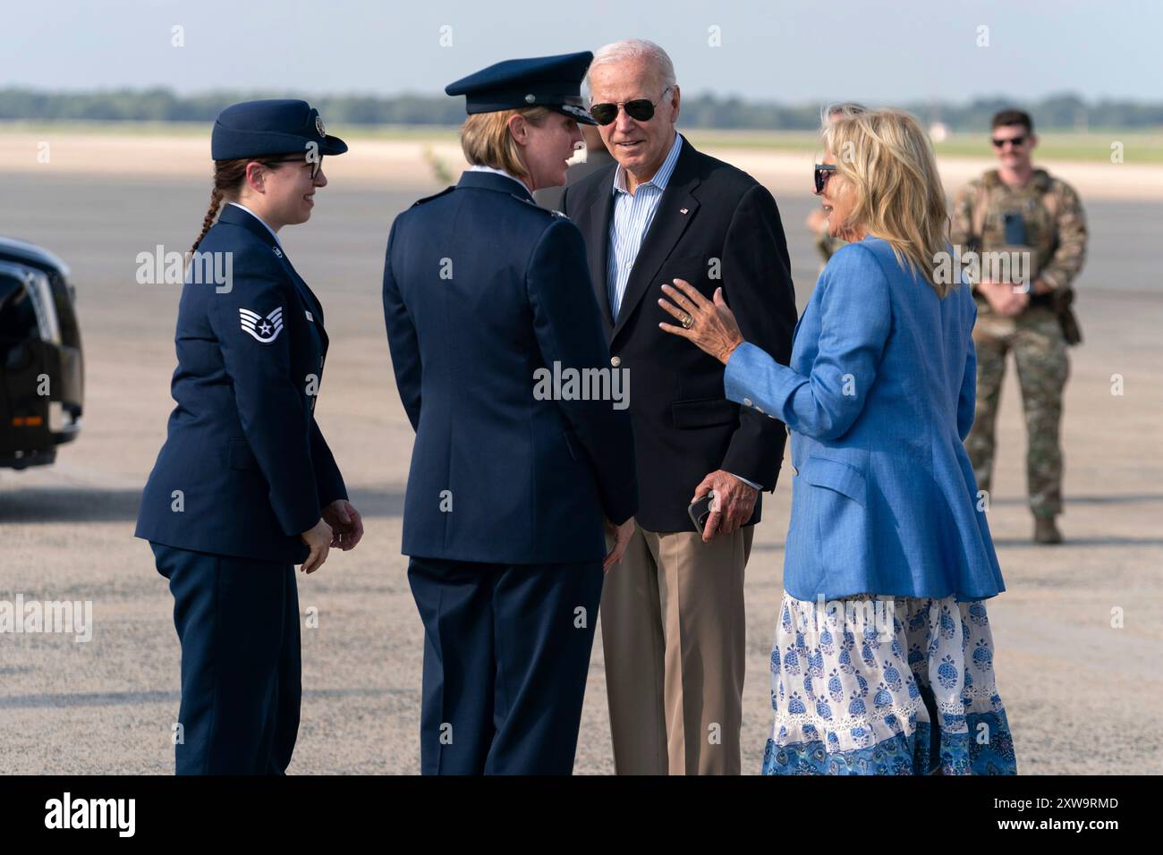 President Joe Biden and first lady Jill Biden are greeted by Commander ...