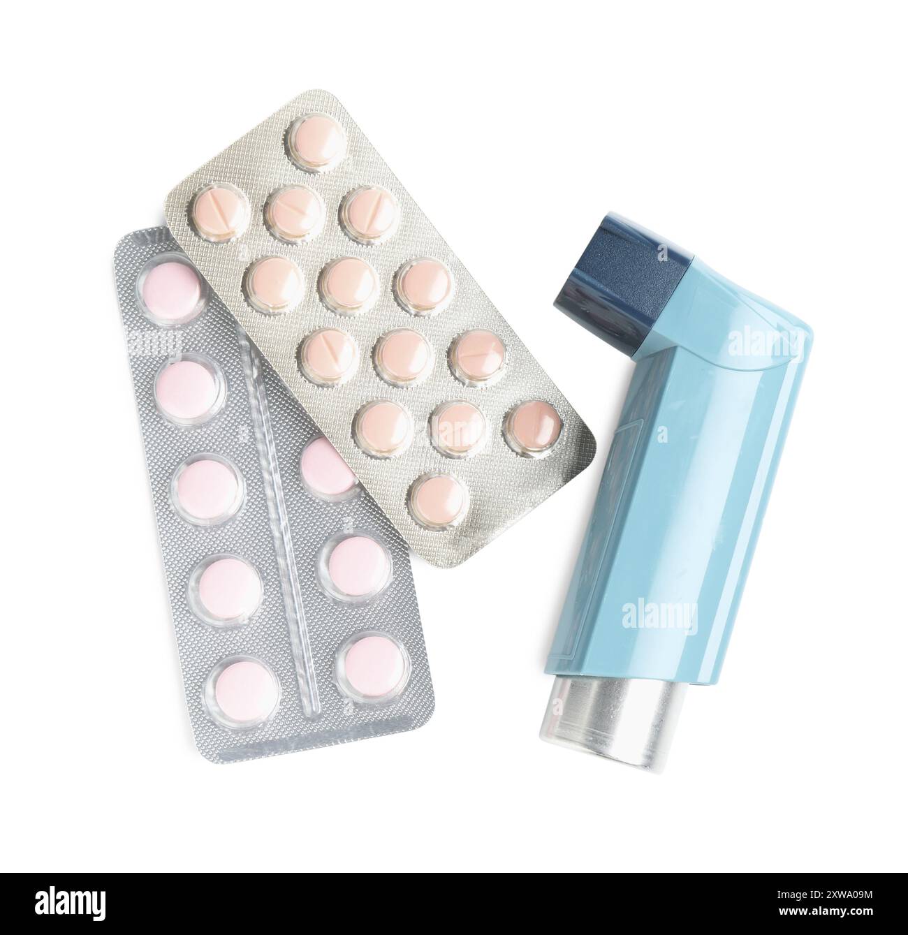 Asthma treatment. Inhaler and pills isolated on white, top view Stock ...