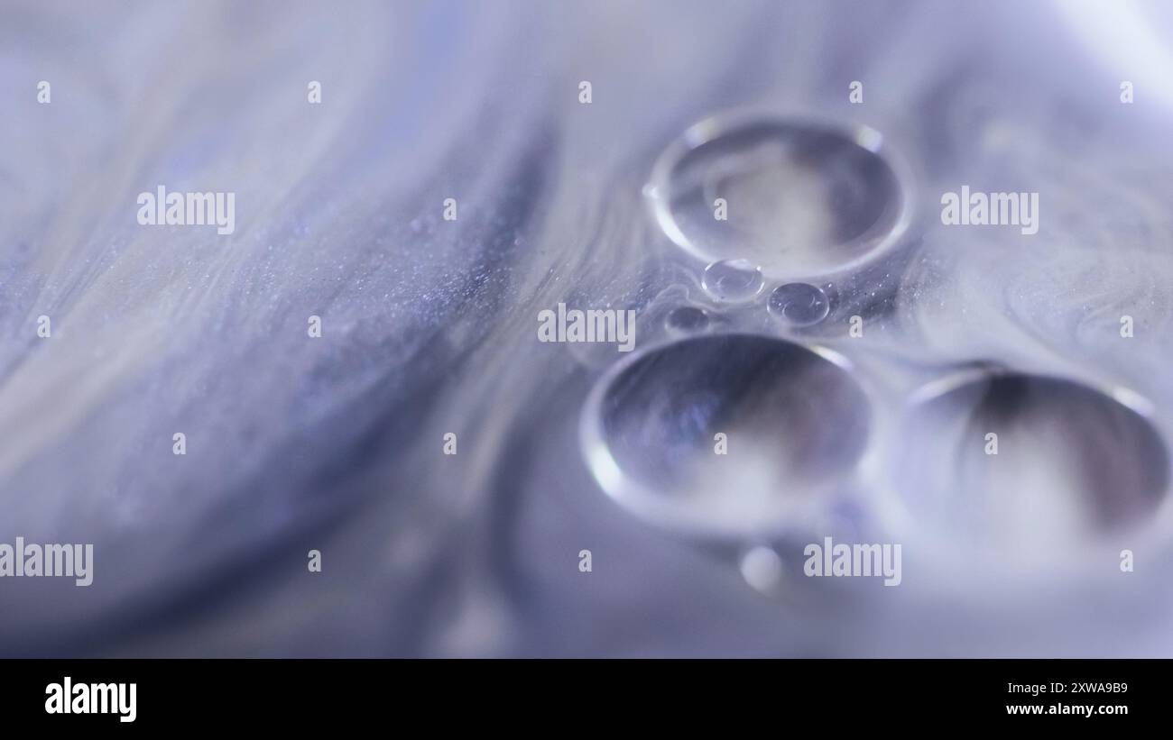 Oil bubbles glitter mist paint hi-res stock photography and images - Alamy