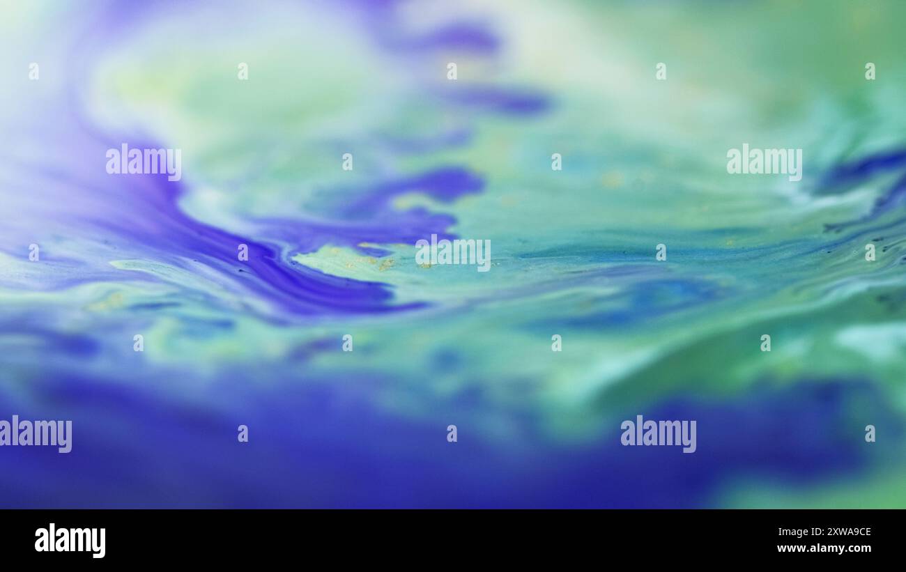 Particles ink fluid spill defocused hi-res stock photography and images ...