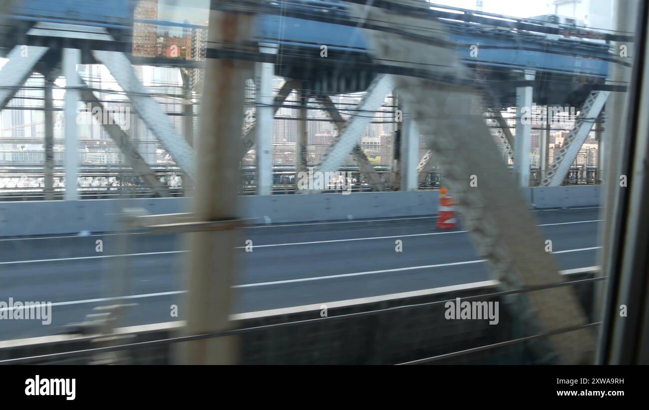 New York City subway train, Manhattan bridge. Shaking camera thru dirty ...