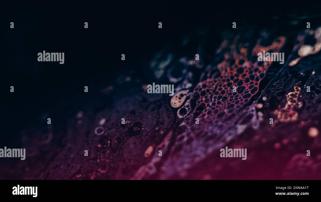 Ink foam. Bubble fluid flow. Defocused blue purple pink color oil ...