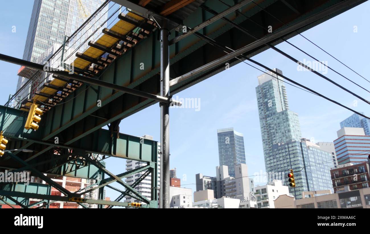 New York elevated subway, metropolitan bridge, metro track above street ...