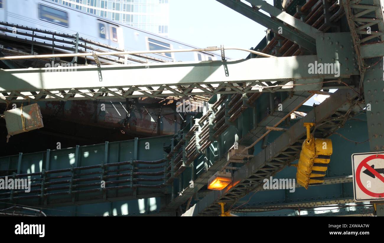 New York elevated subway, metropolitan bridge, metro track above street ...