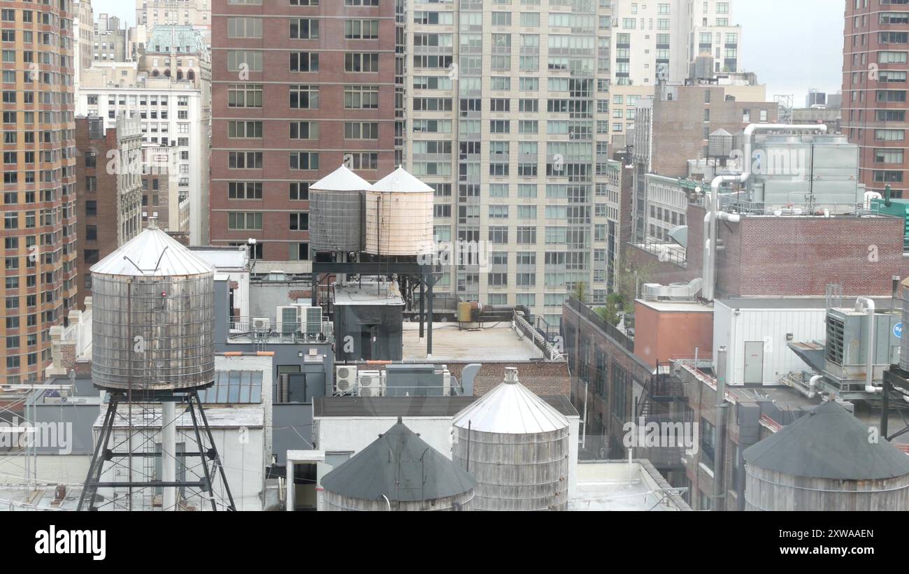 New York City Manhattan cityscape. Rooftop water towers from view point ...