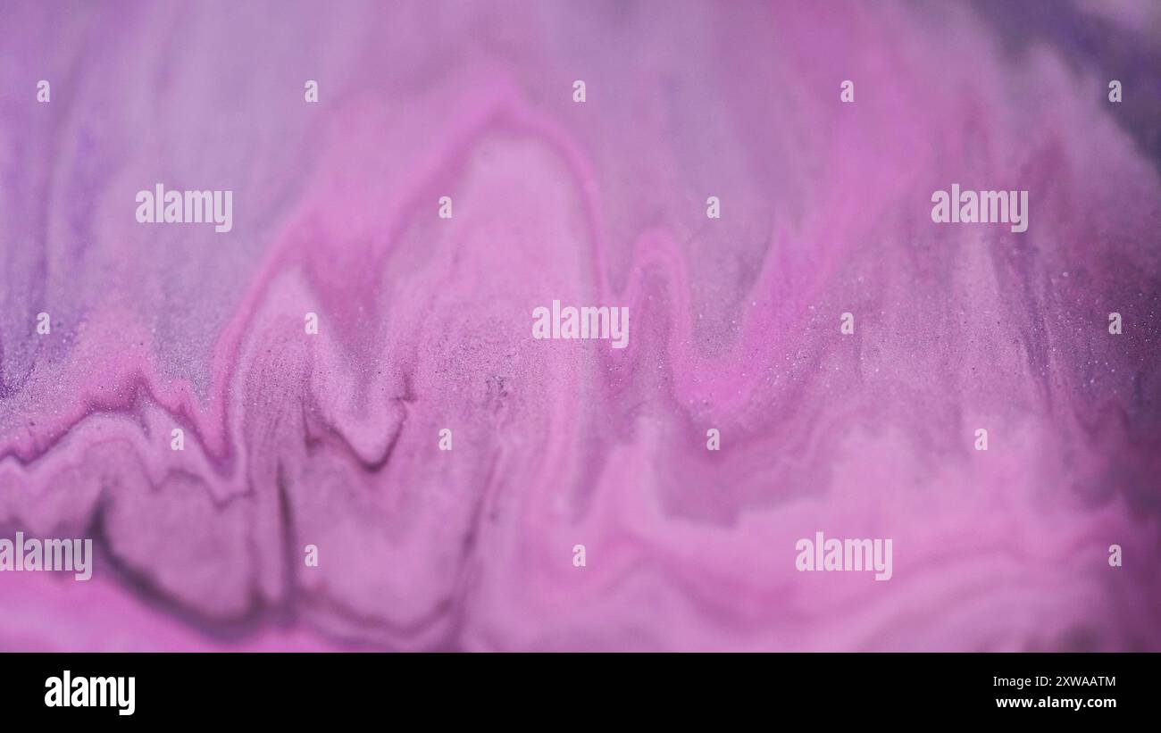 Ink liquid. Magical glitter flow paint. Blur pink purple lavender mix ...