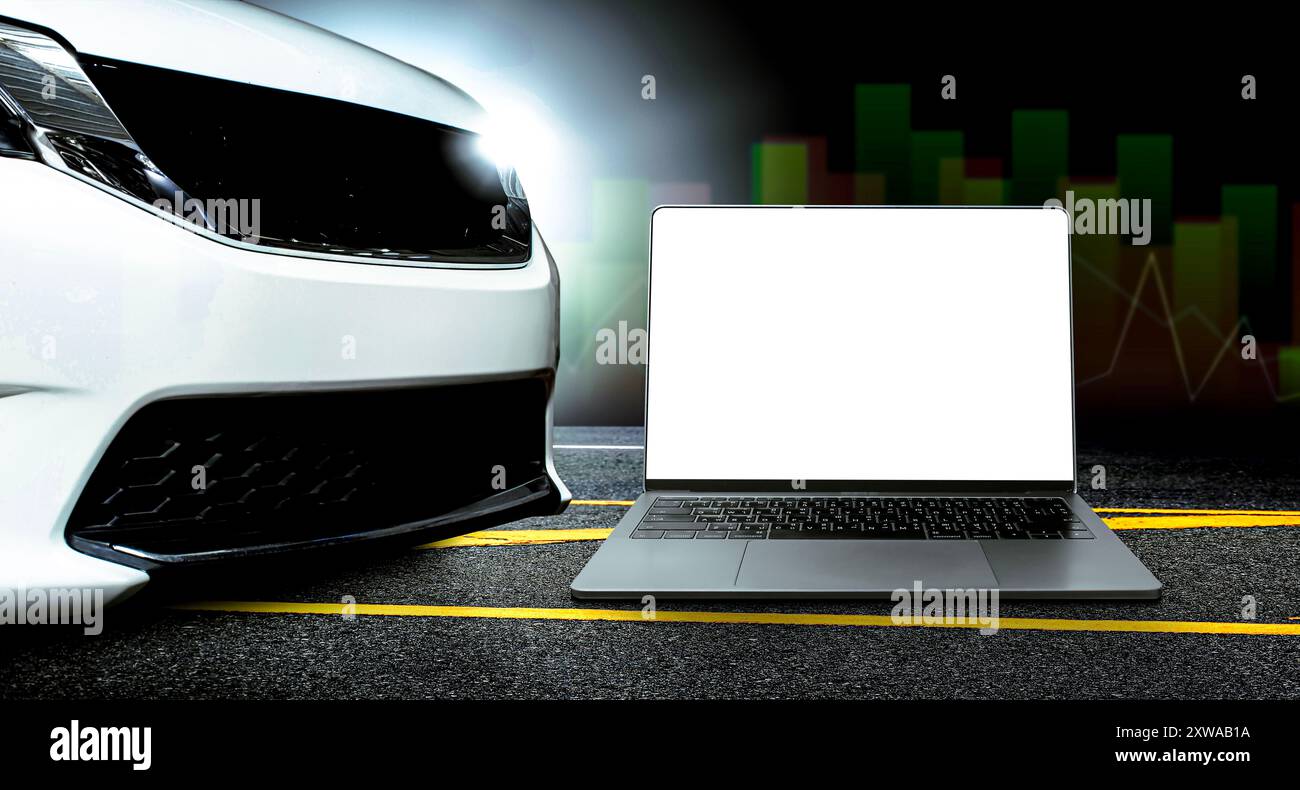 Grey laptop with blank white screen and white car on asphalt road with ...