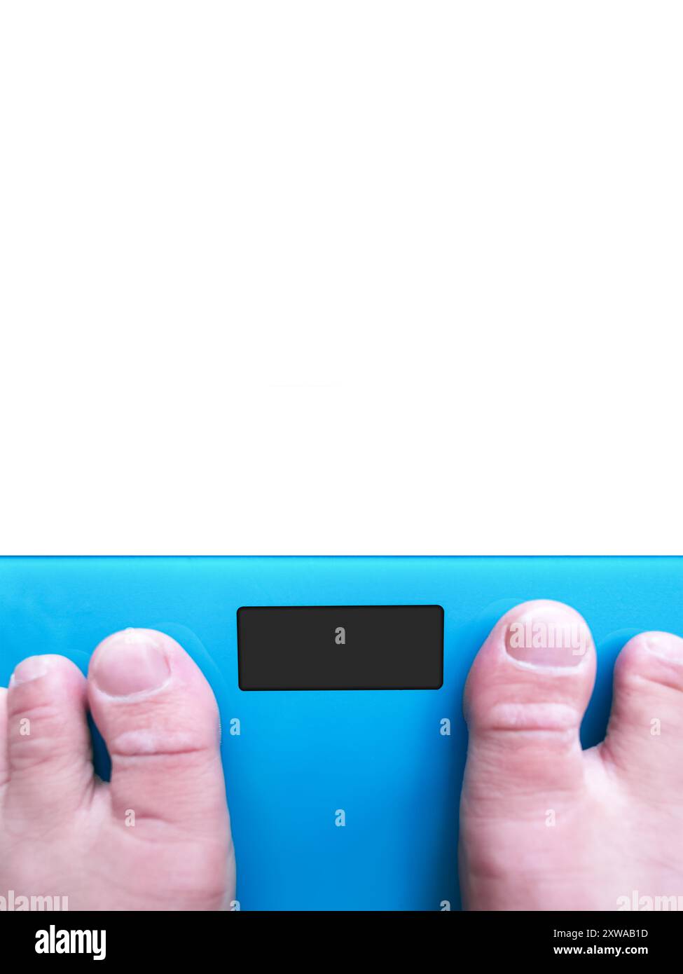 Blank black screen of electronic weighing scale with a barefoot blurred ...