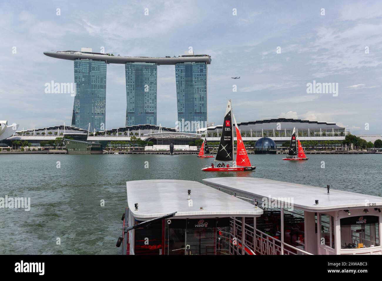Front of Marina Bay Sands (MBS) with water sailing activity and bum ...