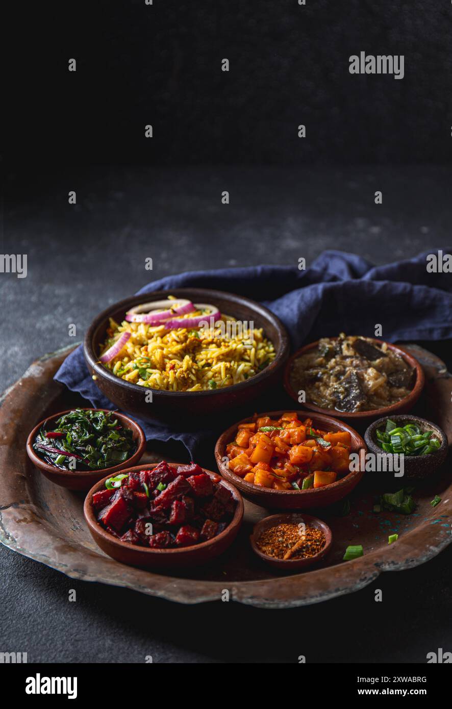 An assortment of vibrant, flavorful vegetarian Pakistani dishes ...