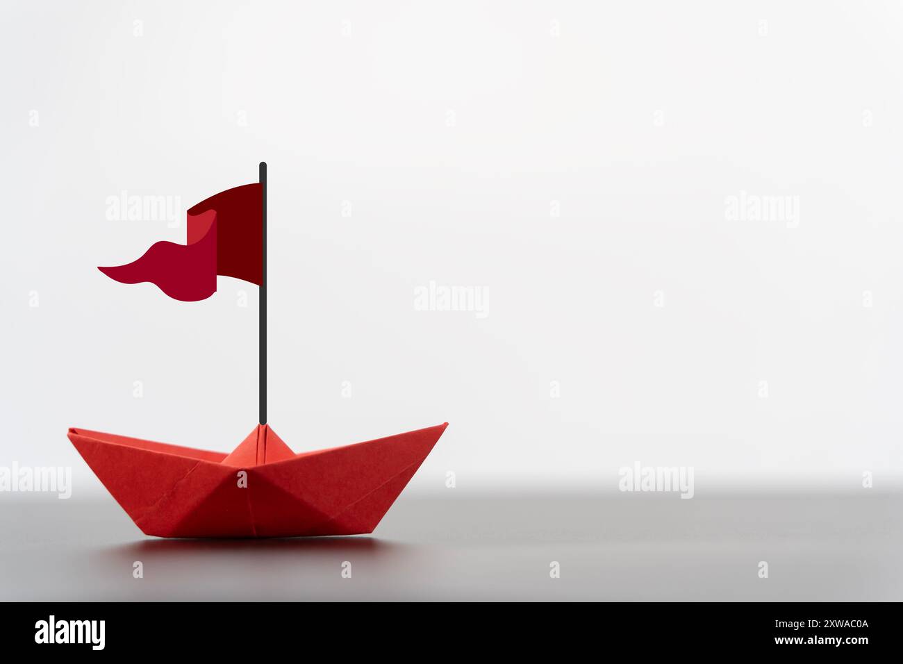 Red Boat. Paper Boat on White Background With Copy Space Stock Photo ...