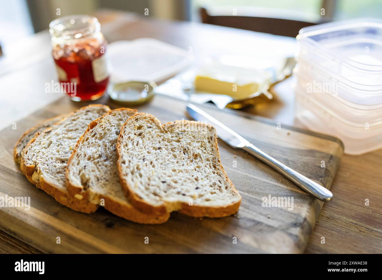 Strawberry jam on bread Stock Photo - Alamy