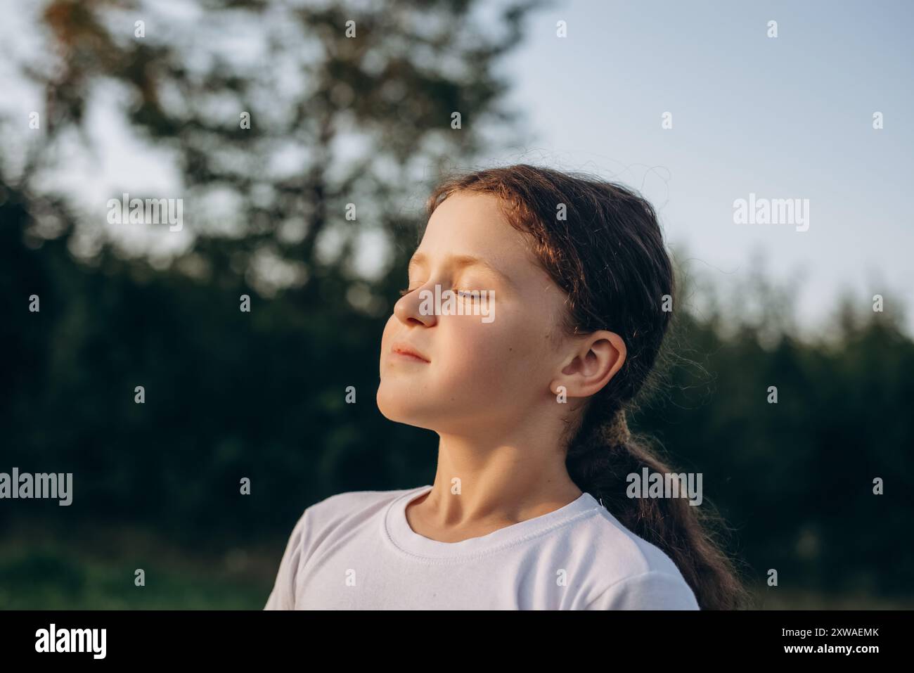 Cute child breathing fresh air. Kid faith, praise and happiness and ...