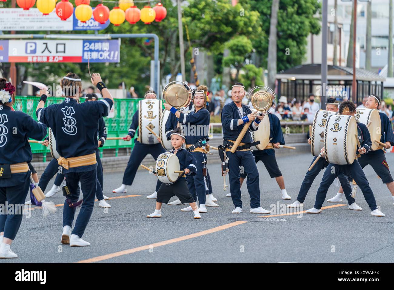 Tokushima Awa Odori Festival 2024. Performers wear traditional obon costumes, dance and sing as ...