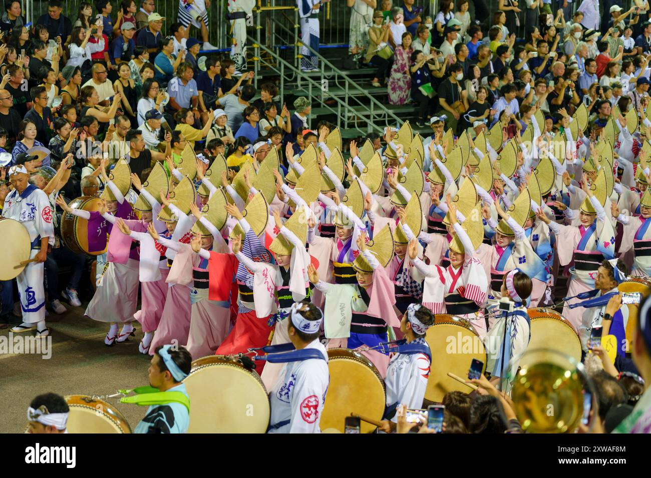 Tokushima Awa Odori Festival 2024 Soodori. All of performers dance and sing in a formation as ...