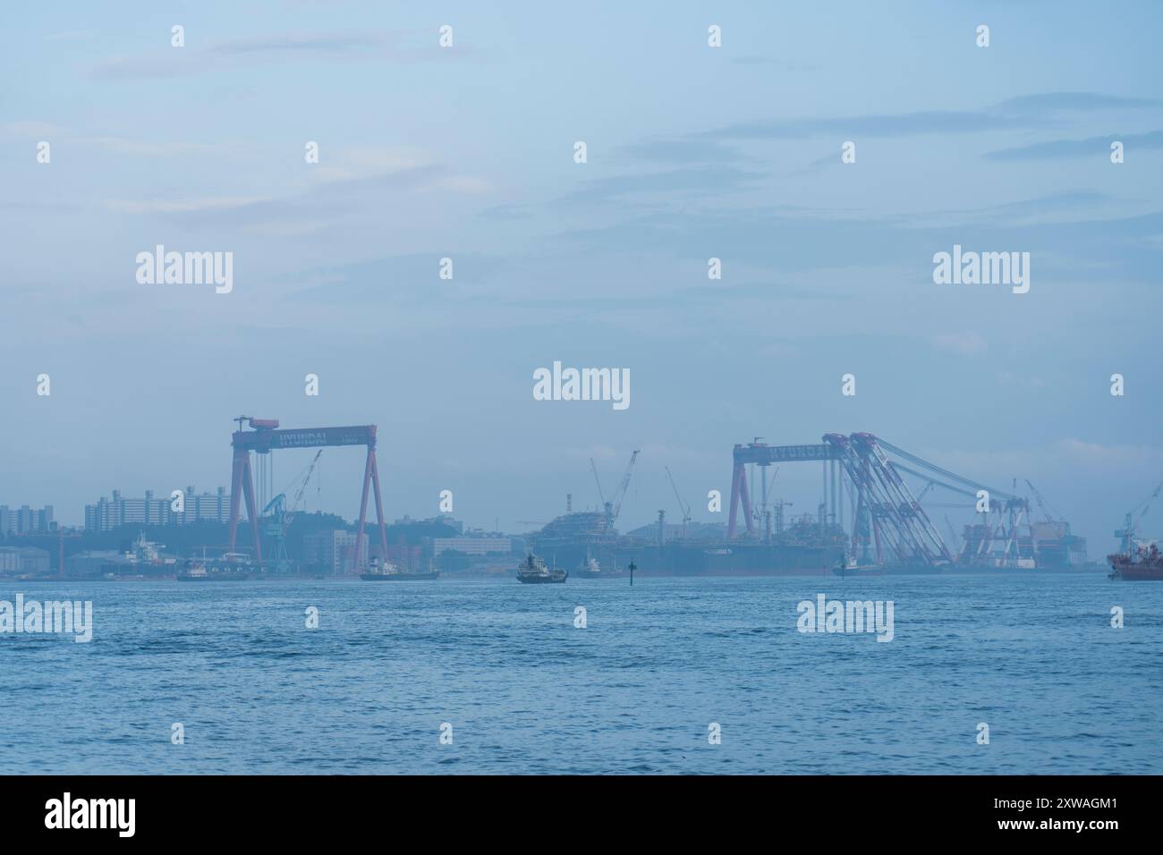 A heavy lift vessel lifting a 2500 Metric tonne steel structure deck in ...