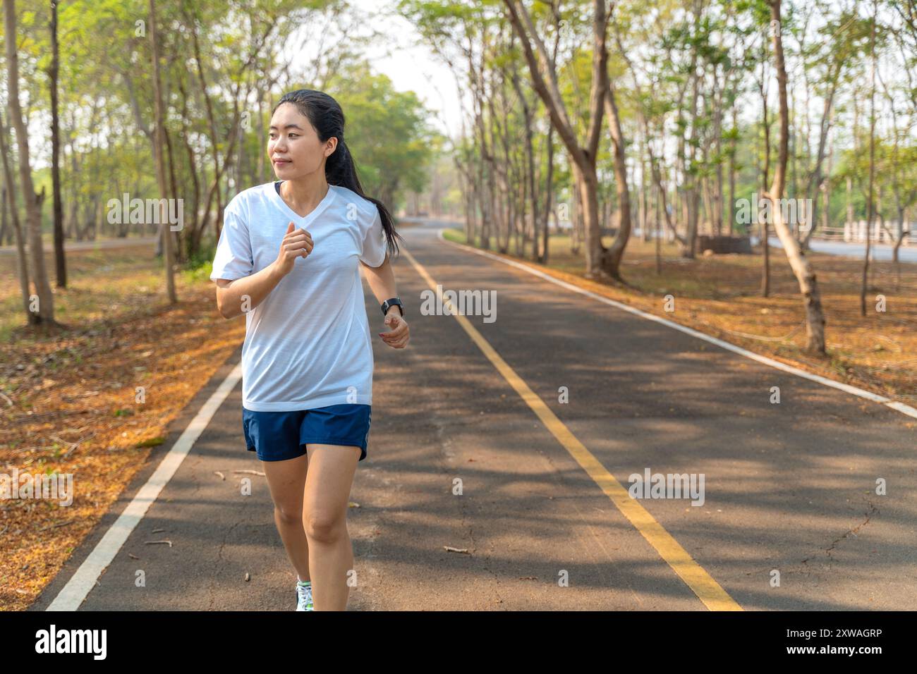 Two young sisters in park hi-res stock photography and images - Alamy