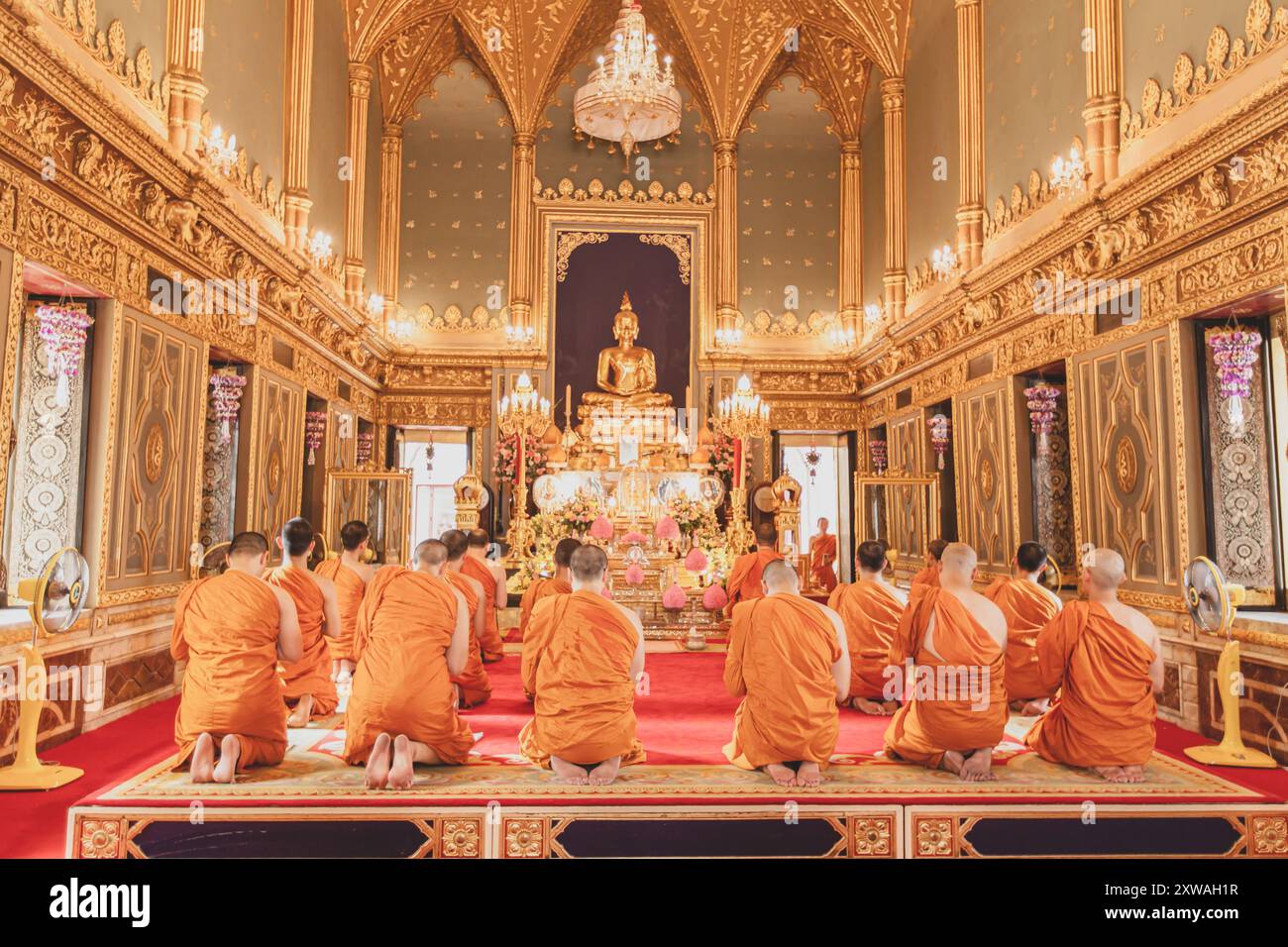 Buddhist monks evening prayer chanting in the ancient temple at Wat ...
