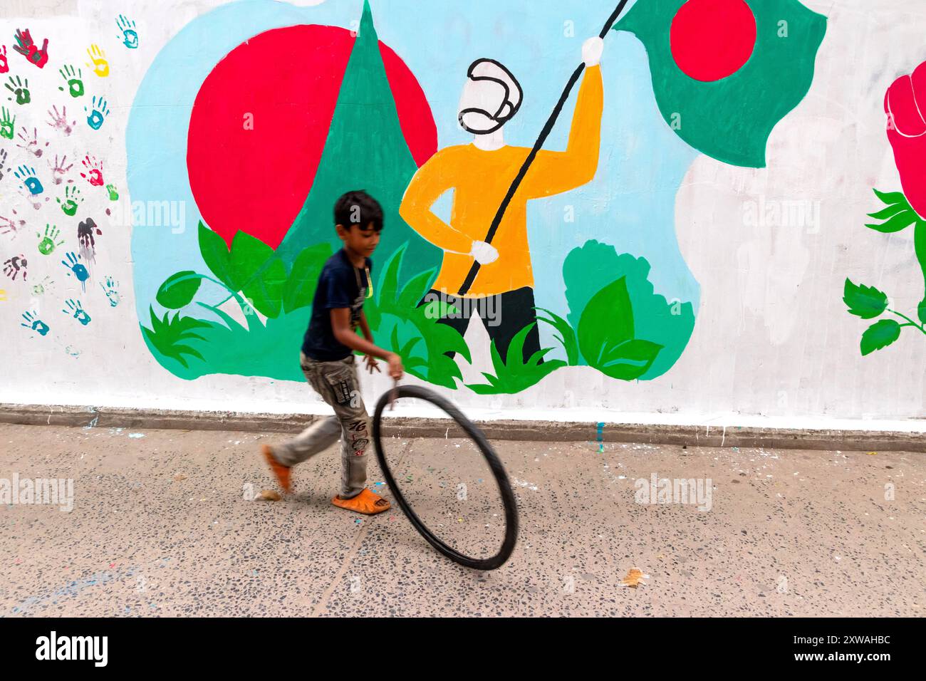 Narayanganj, Dhaka, Bangladesh. 19th Aug, 2024. Students paint graffiti ...